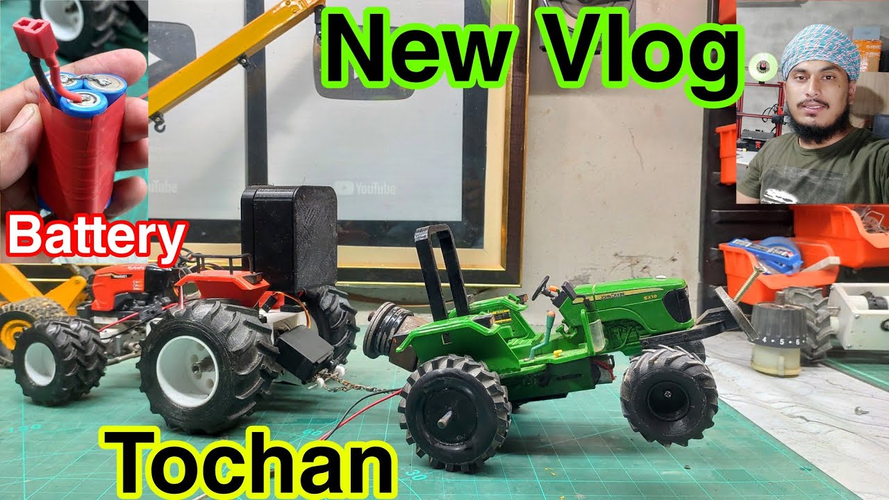 John Deere tractor tochan with Kubota and new battery - YouTube