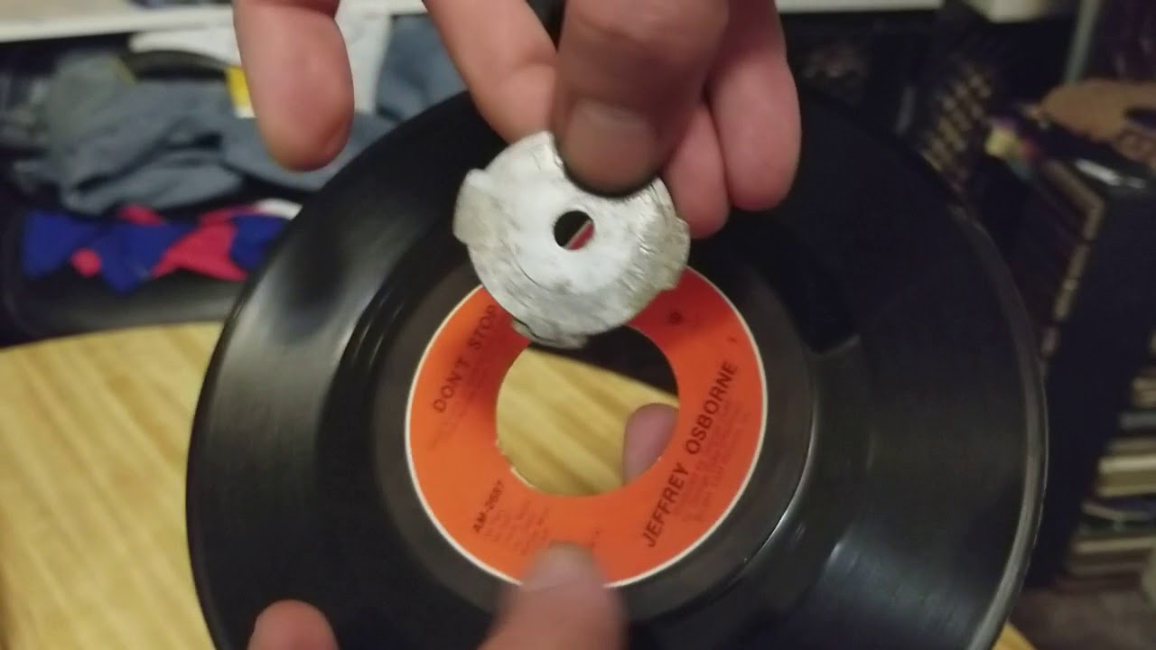 How to remove a metal center from 45 rpm record! - YouTube