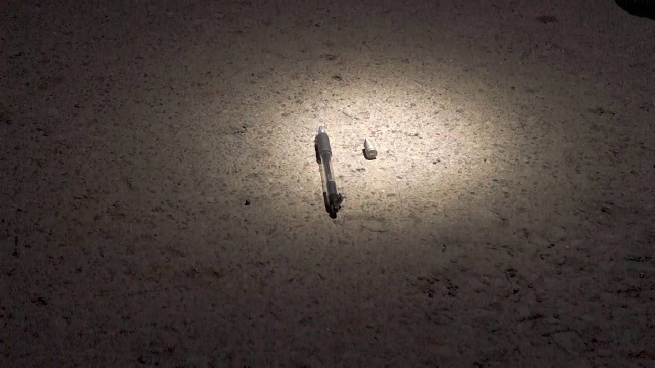 Bullet shell casings on ground - YouTube