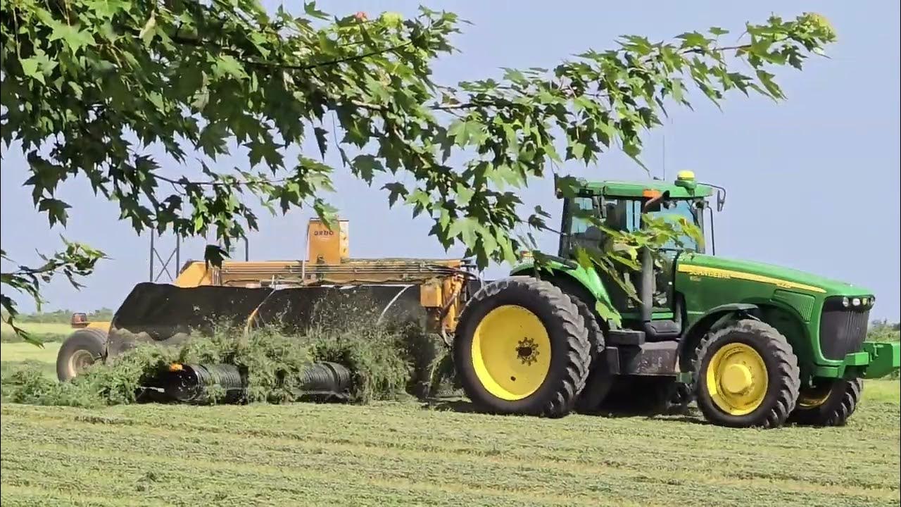 Big time hay alfalfa raking with a John Deere 8220 tractor and Oxbo hay belt merger raker - YouTube