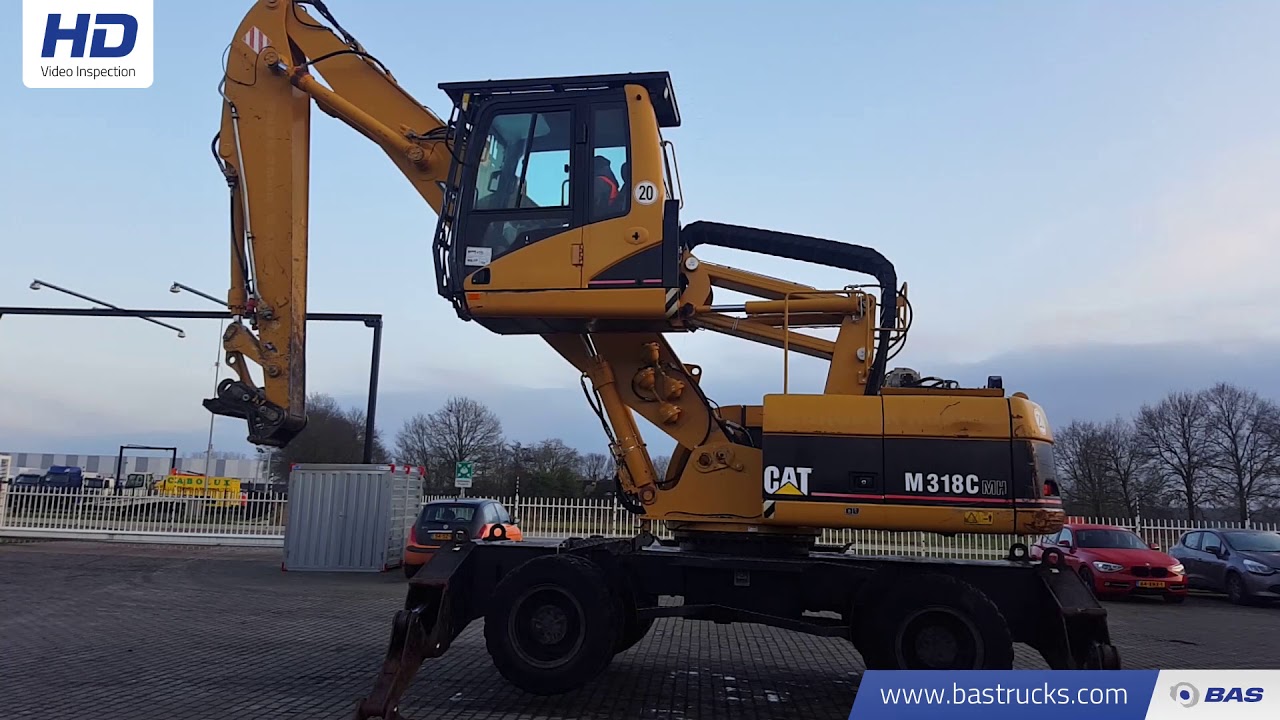 70119415 Caterpillar M318C - YouTube
