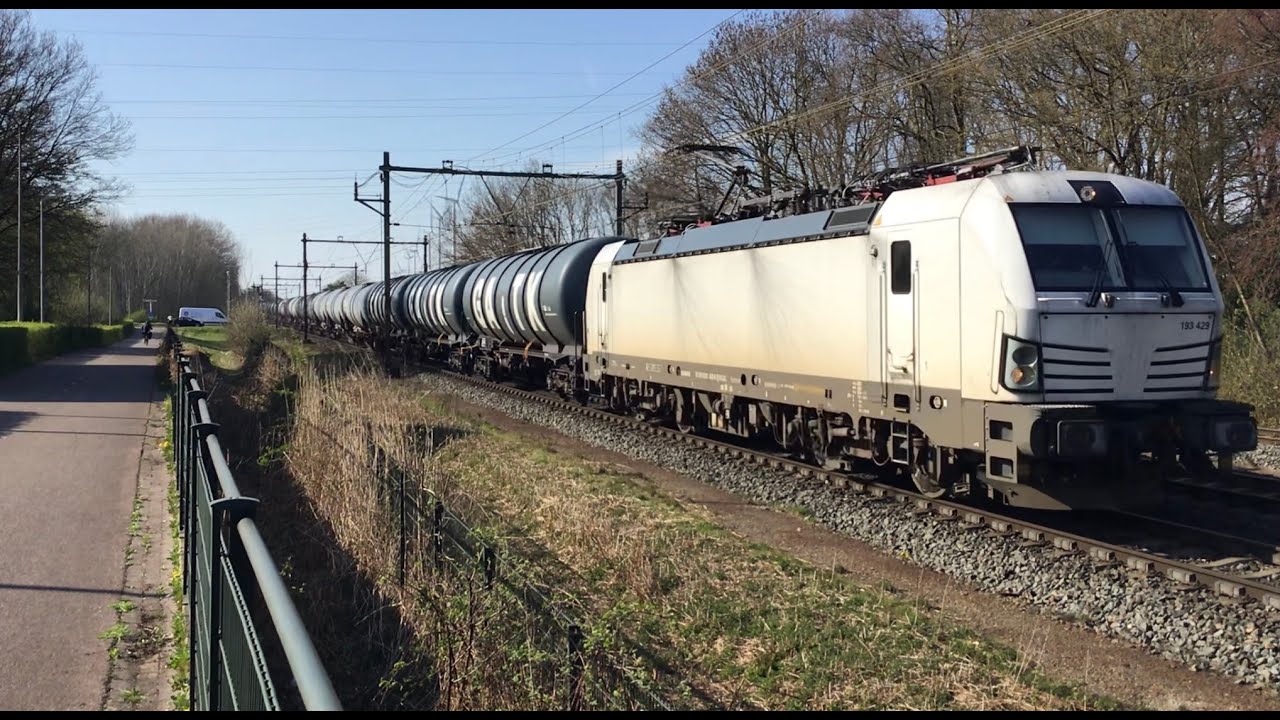 White Vectron locomotive RTB Cargo with Tankers Freight Train at ...