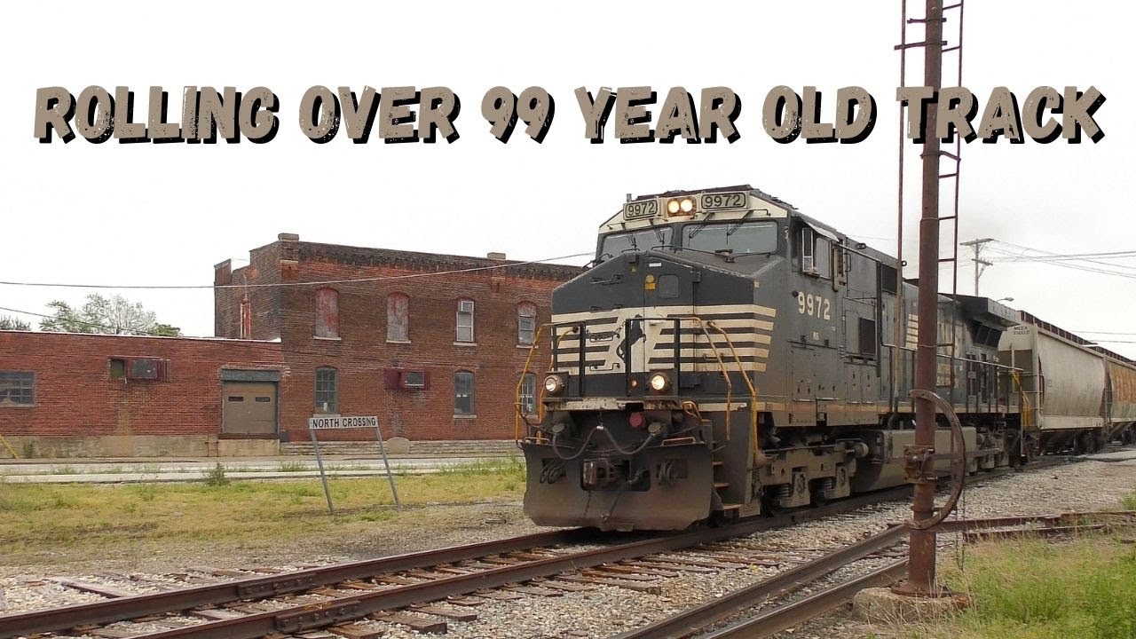 Long and heavy train rolls over 99 year old track with a DPU. First ...