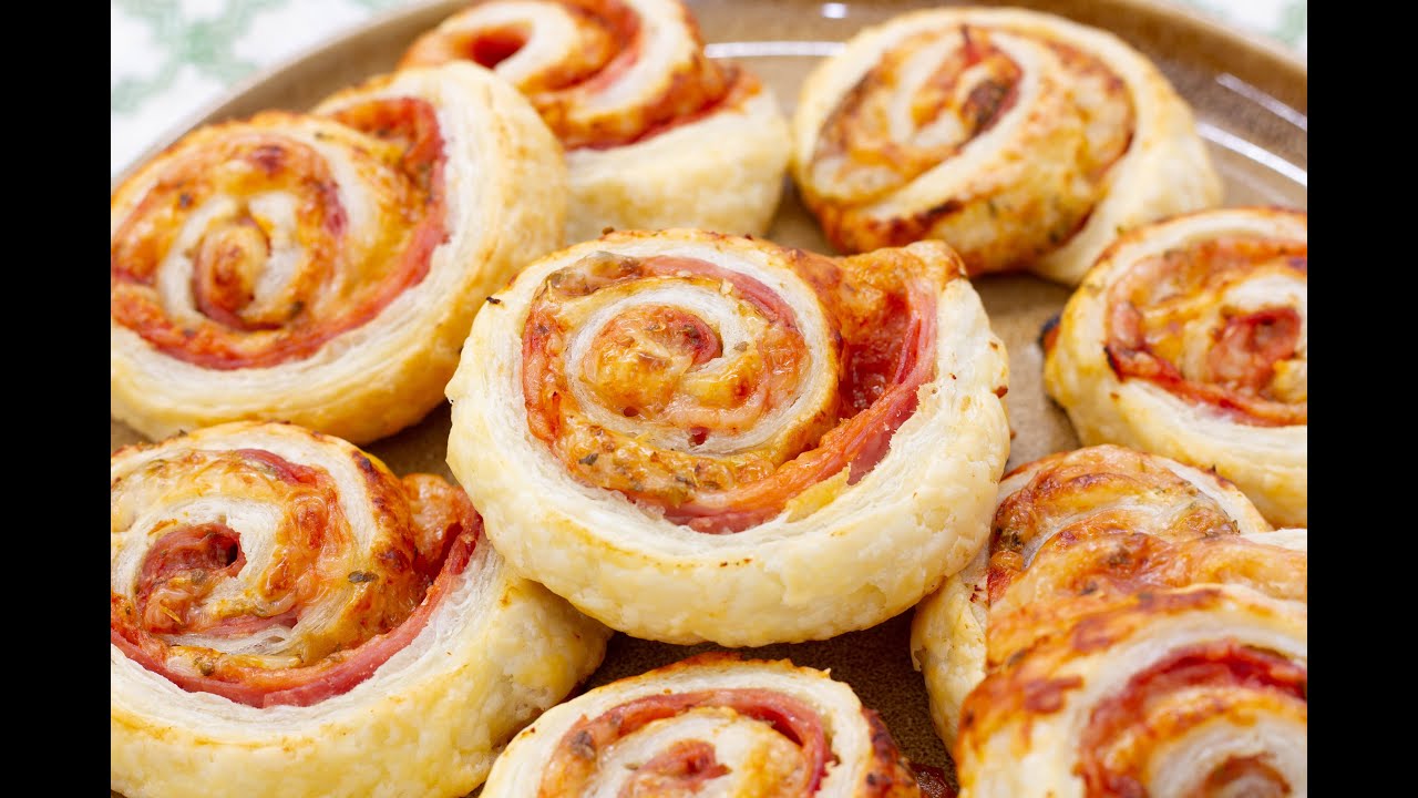 Puff pastry rolls with ham and cheese. Super easy party snack. # ...