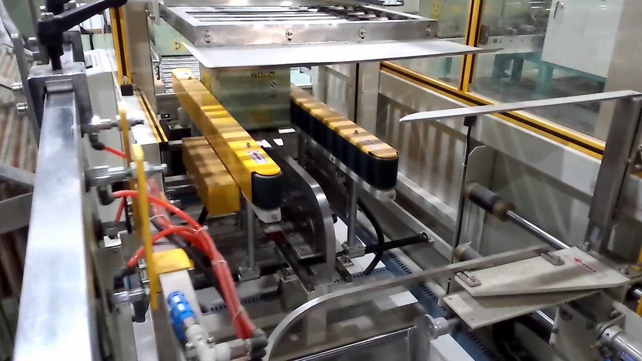The fully automatic packing machine in rice mill factory - YouTube