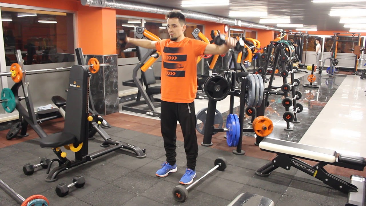 STANDING DUMBBELL LATERAL RAISE - YouTube