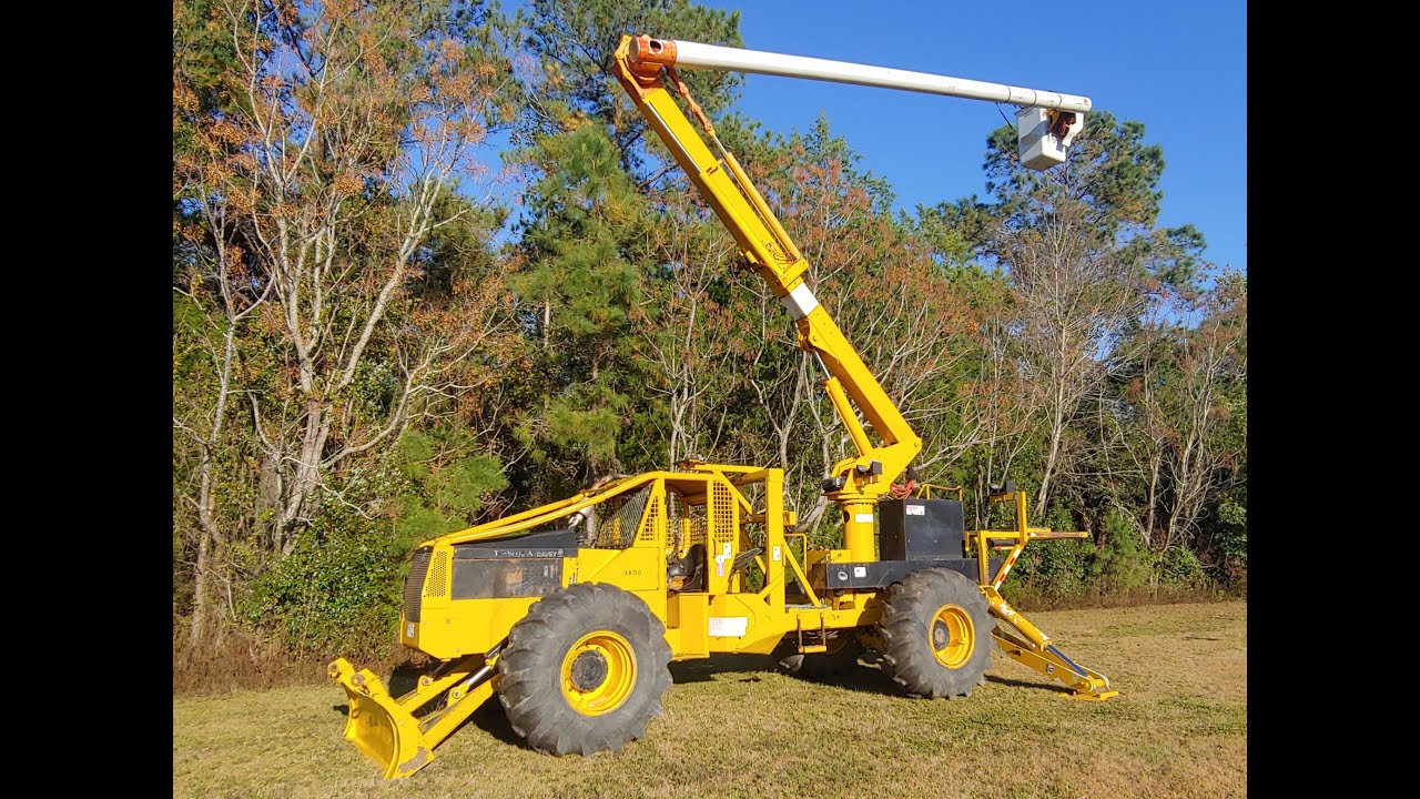 1993 Timberjack 240E bucket skidder - YouTube