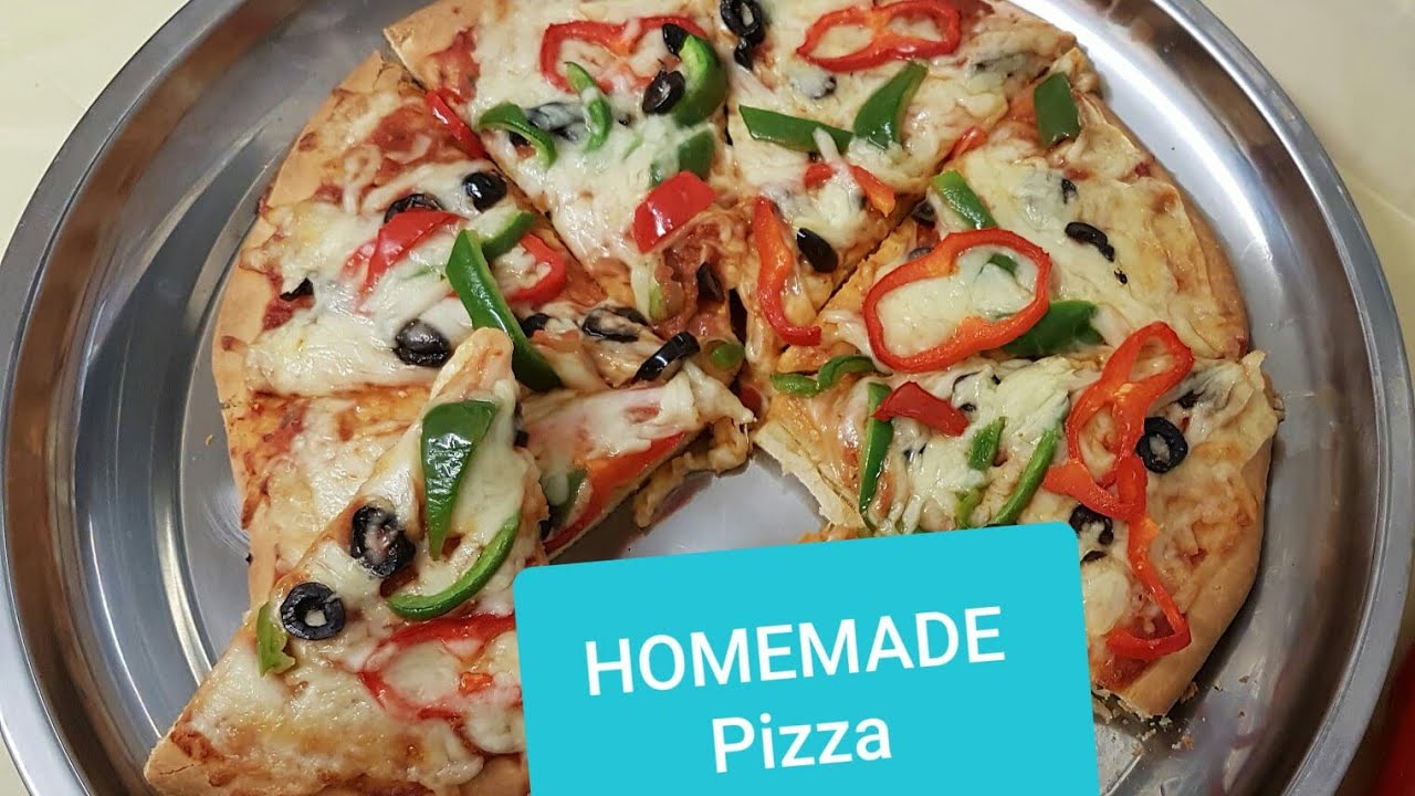Make Pizza with African Taste Bakery - YouTube
