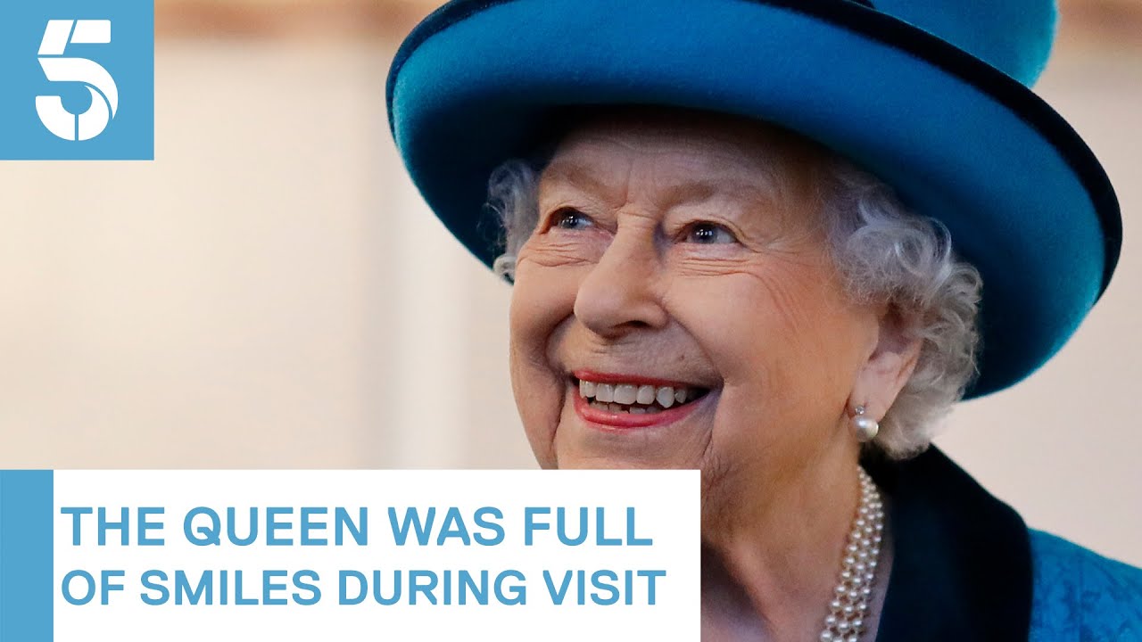The Queen smiles as she celebrates Royal Philatelic Society anniversary ...