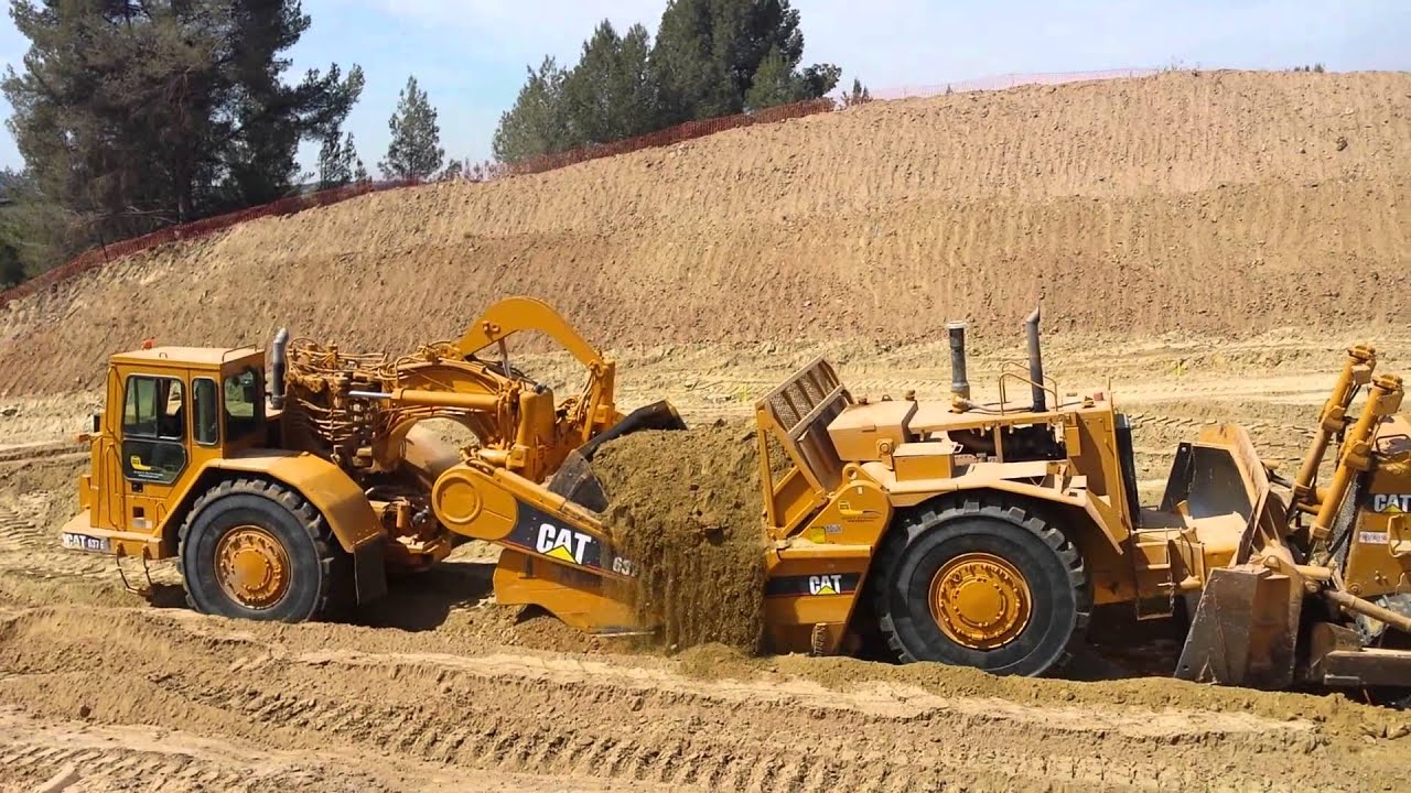 CATERPILLAR D9N DOZER PUSHING CATERPILLAR 637E SCRAPER CAN PIPA - YouTube