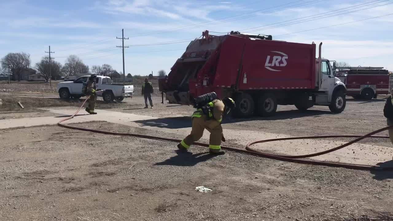 Firefighters respond to burning trash truck in Shawnee County - YouTube