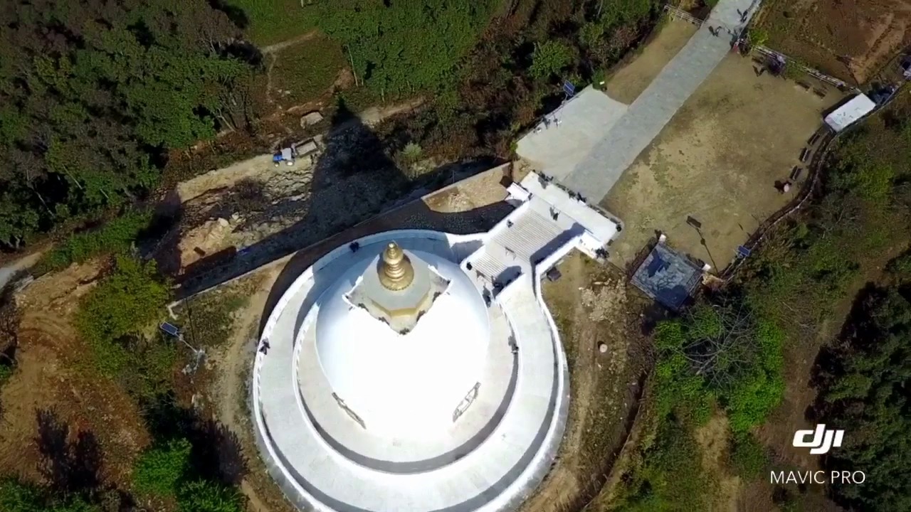 Drone view of Taal Barahi and Santhi Stupa in Pokhara, Nepal from Mavic ...