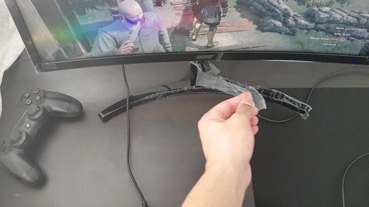Peeling off the plastic from my 144hz monitor - YouTube