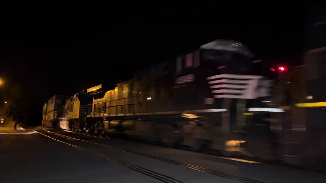 NS 1068 “Erie” SD70ACe leads NS 20x through Piscataway,NJ (engineer ruins shot with lantern ...