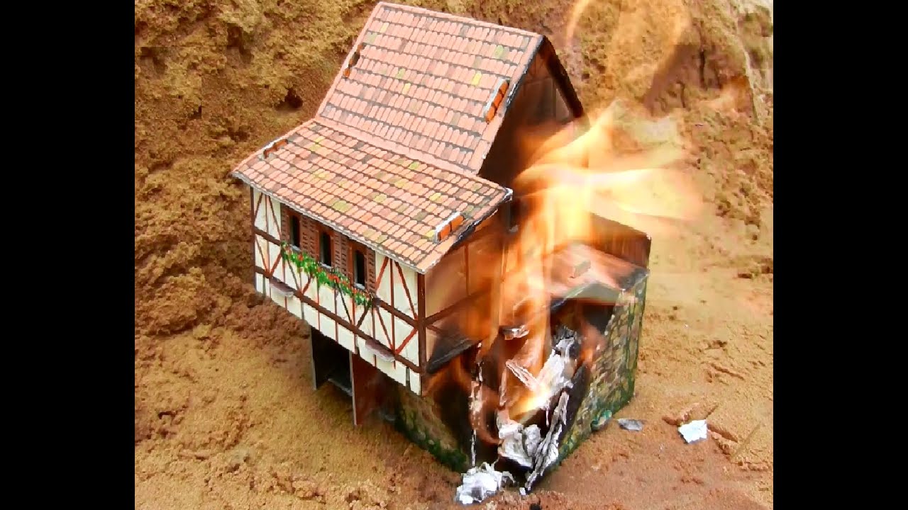 A water mill made of cardboard is burning - YouTube