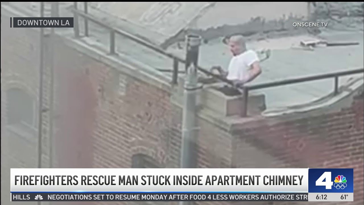 Firefighters rescue man stuck in downtown LA building's chimney - YouTube