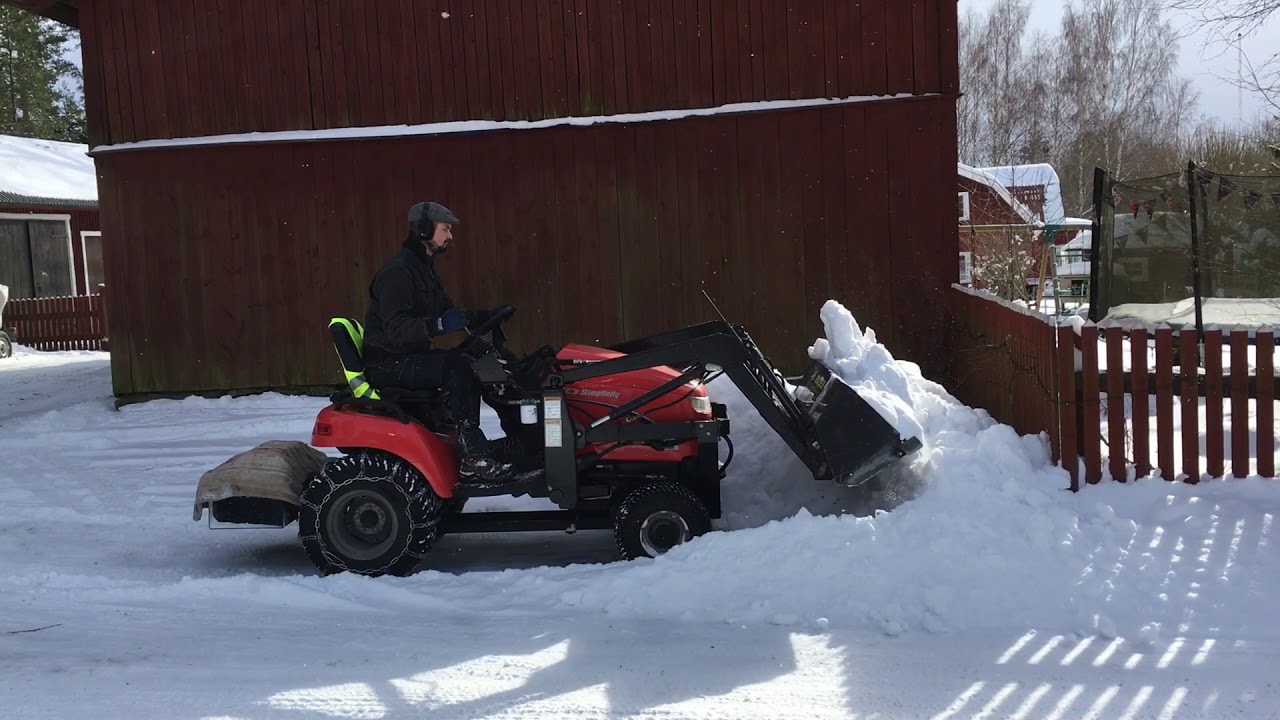 Clearing snow with the Simplicity Legacy front end loader. - YouTube