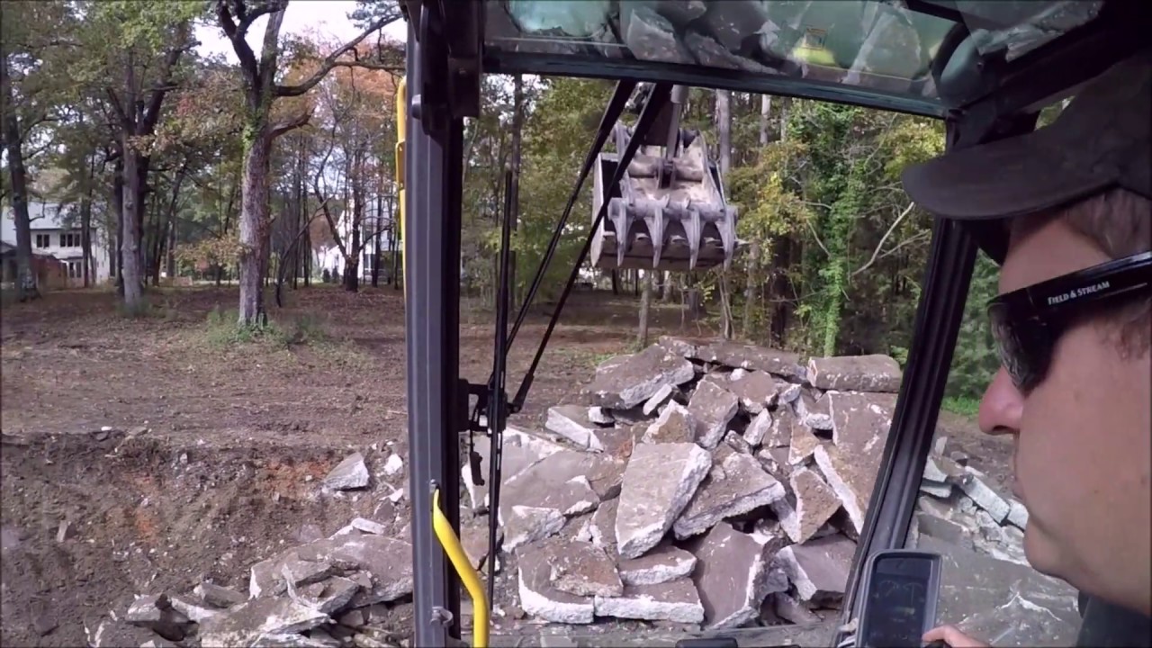 Excavator Ripping Up Concrete Driveway - YouTube