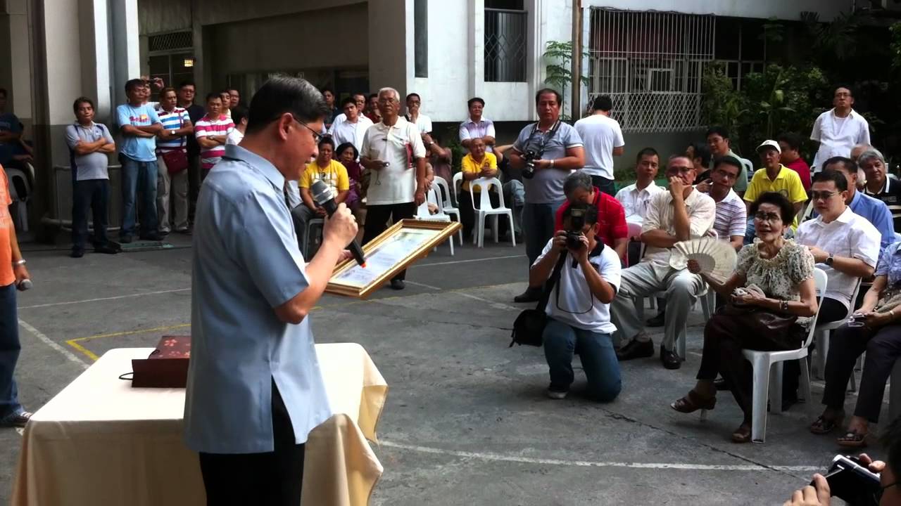 ArchBishop Chito Tagle giving award to Fr. Paul - YouTube