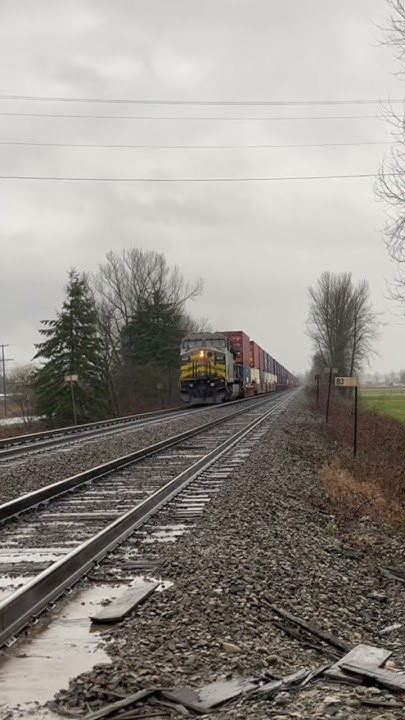 KCSM 4537 on CPKC 112 with cool yellow nose stripes - YouTube