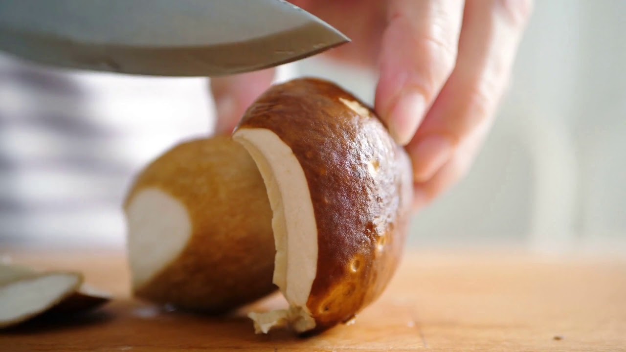 shot of woman chef cutting mushrooms on chopping wooden - YouTube