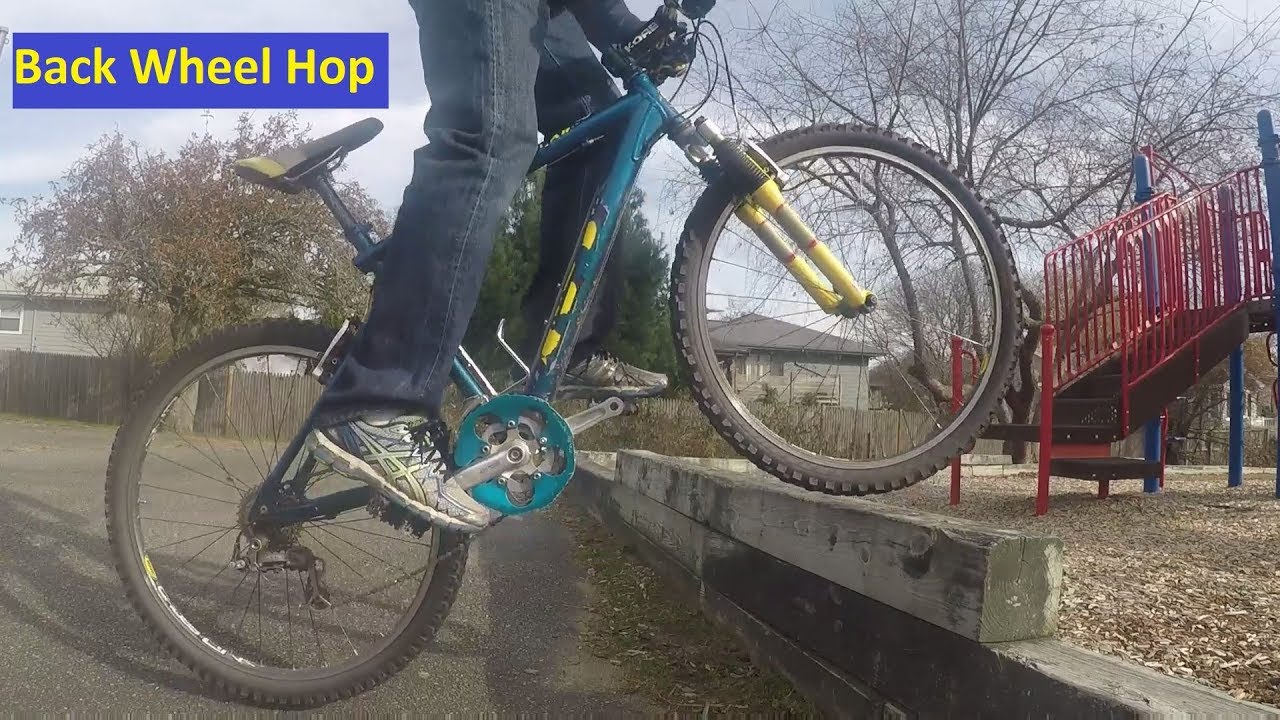 Back Wheel Hop with Front Wheel on Ledge, Mountain Biking - YouTube
