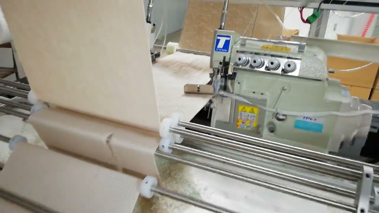 AUTOMATIC DOUBLE LAYER FABRIC LENGTH SEWING MACHINE - YouTube