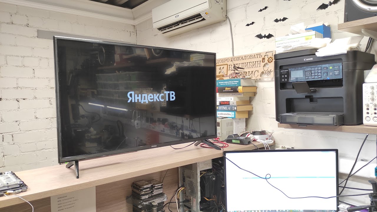 Телевизор Novex NWX-40F171MSY висит на логотипе. Рабочий день ...