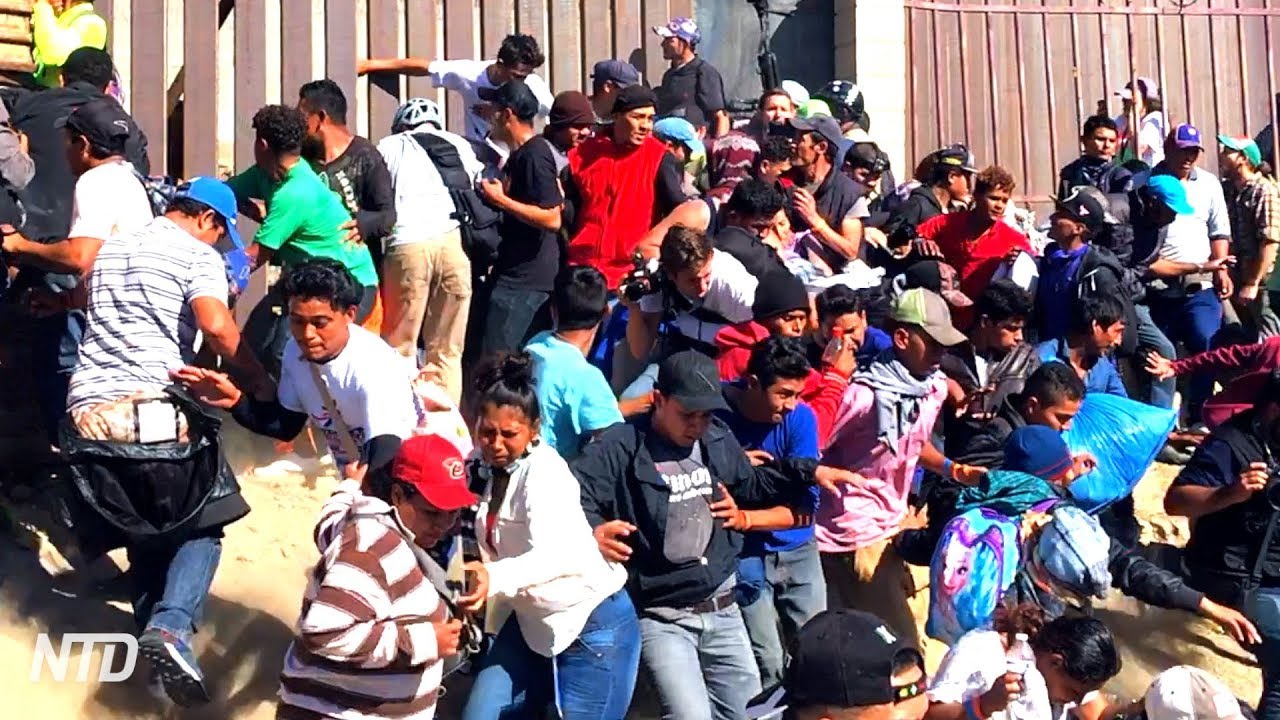 Mexico deports 100 ‘violent’ migrants after border rush - YouTube