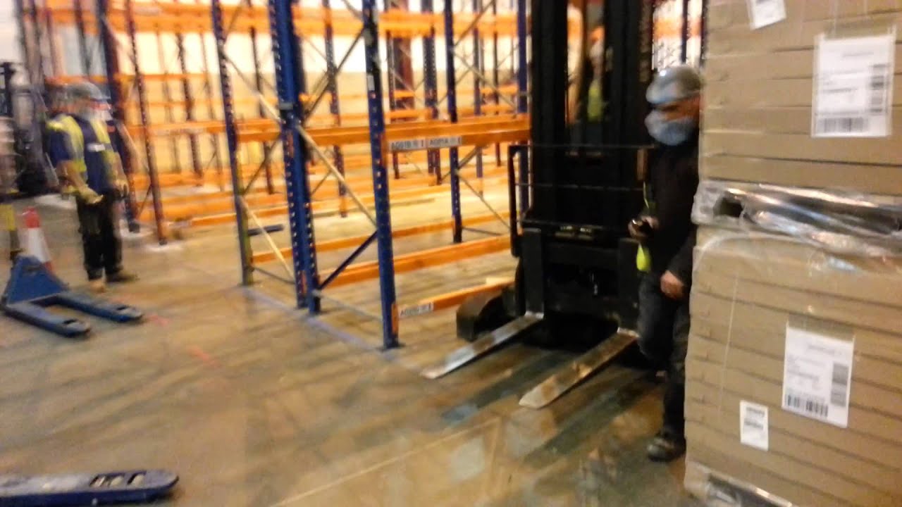 Not a safe way to move pallet racking - YouTube