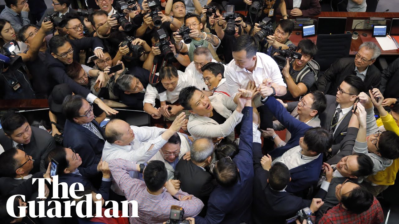 Brawl breaks out in Hong Kong parliament - YouTube
