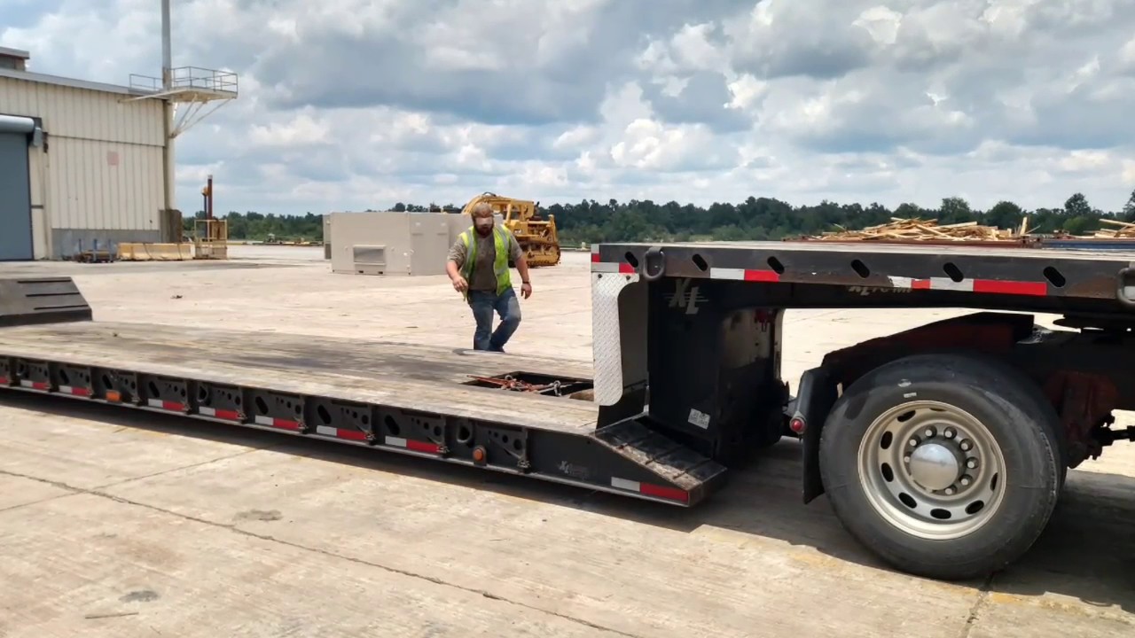 Moving heavy equipment?! - YouTube