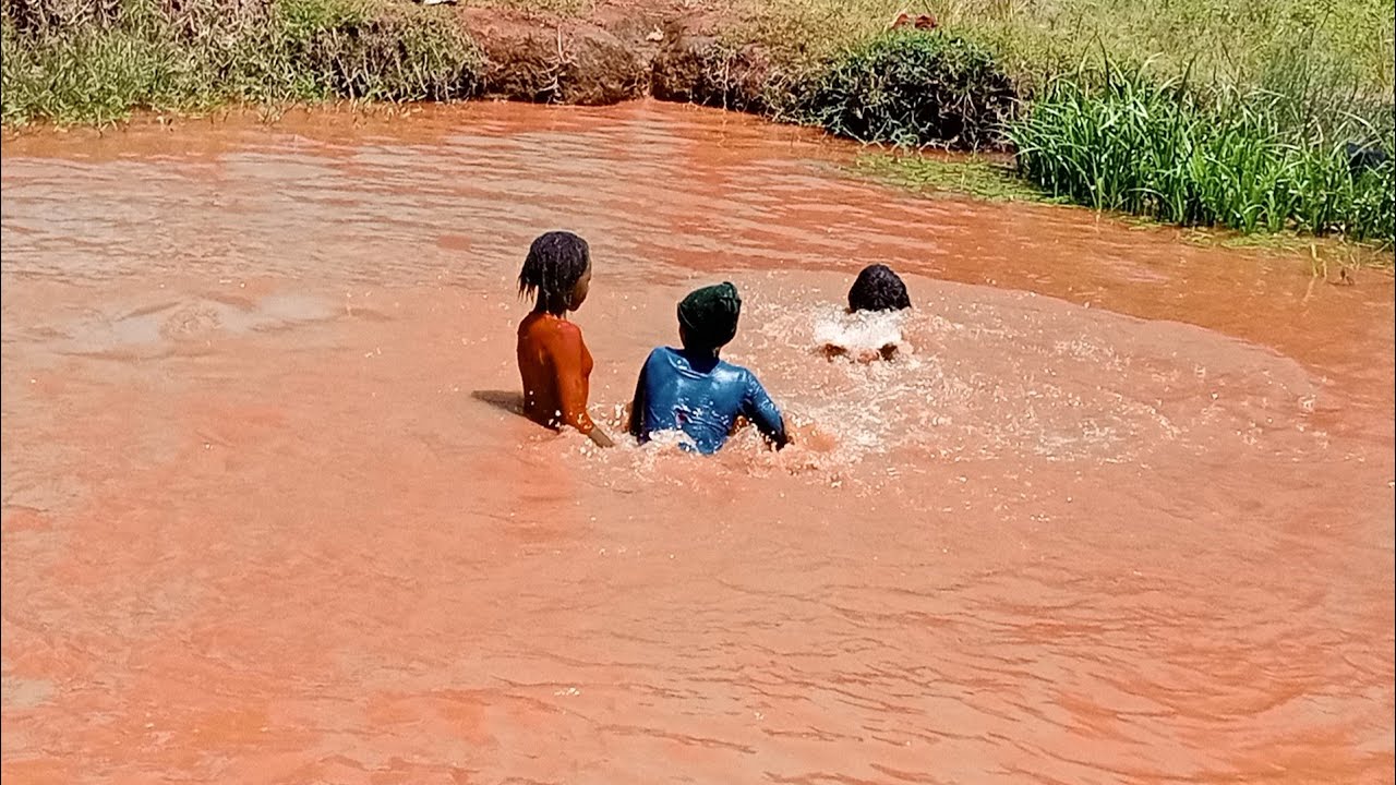 African village life kids swimming lessons in Africa village - YouTube