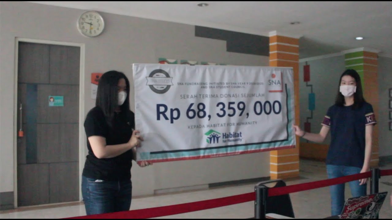 Handing Over Donation to Habitat for Humanity - YouTube