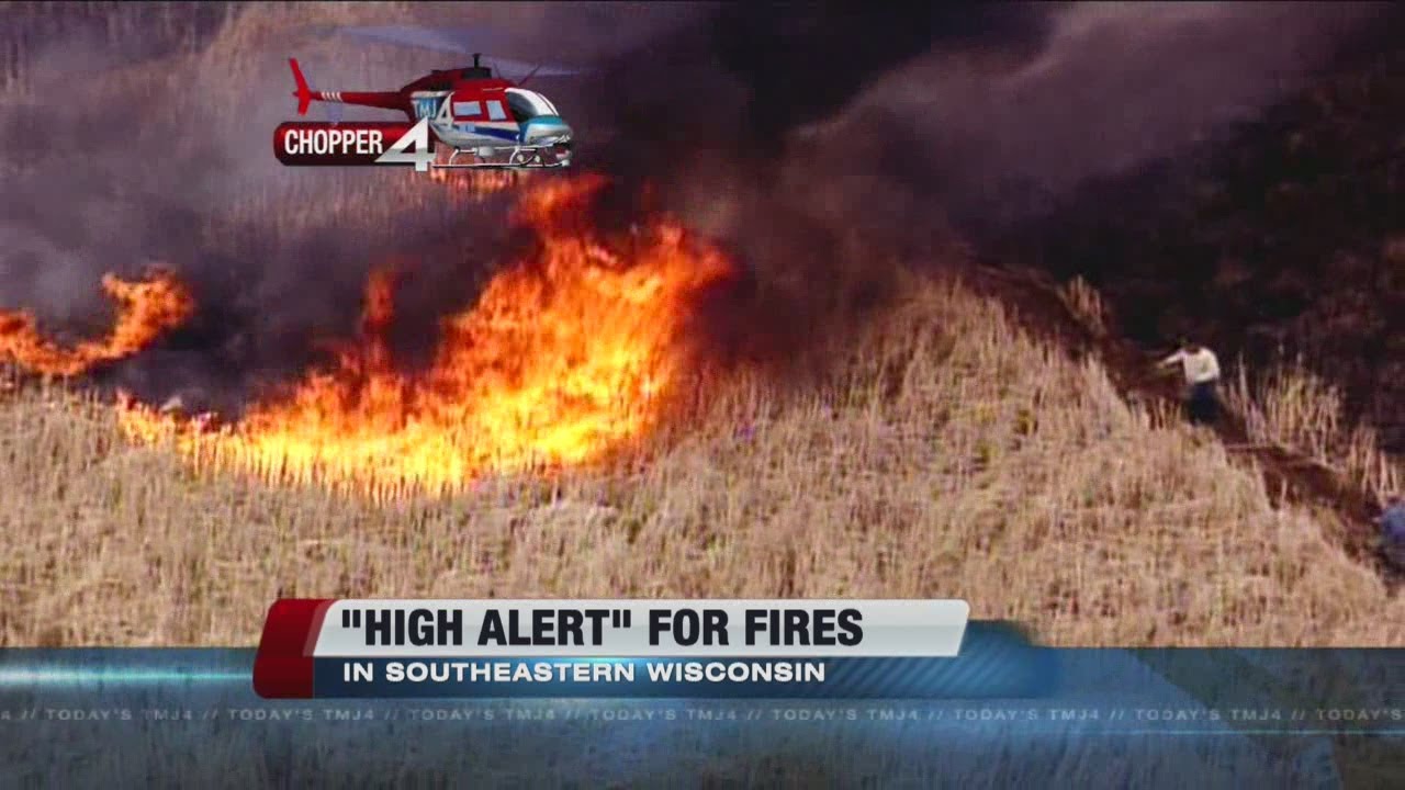 Crews battle several area fires, including large marsh fire - YouTube