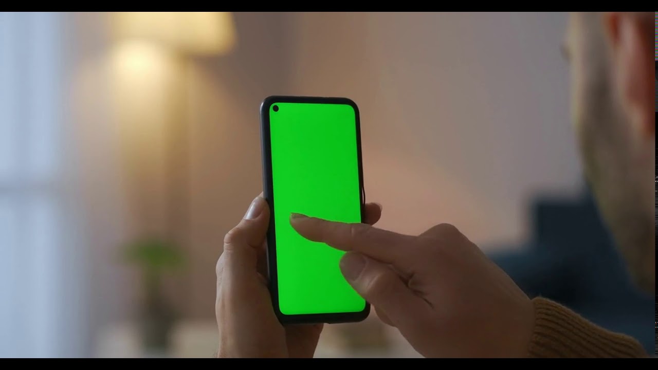 Man is using smartphone green screen - YouTube