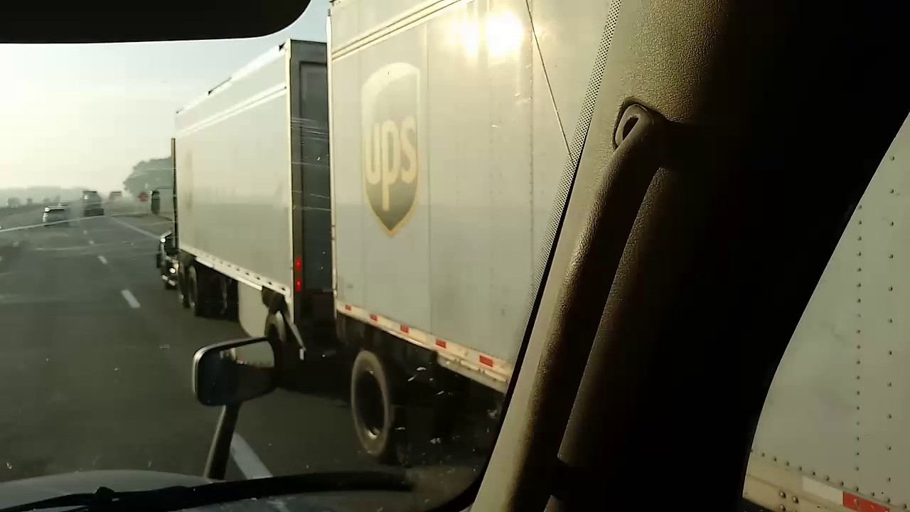Passing a set of UPS triples in Ohio - YouTube