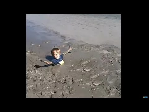 kid gets stuck in deep quicksand..
