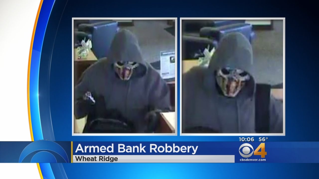 Robber With Frightening Mask Targets Bank - YouTube
