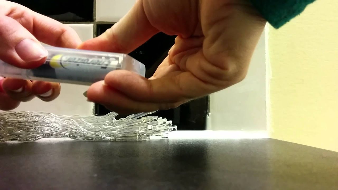 Installing AA batteries in battery holder - YouTube