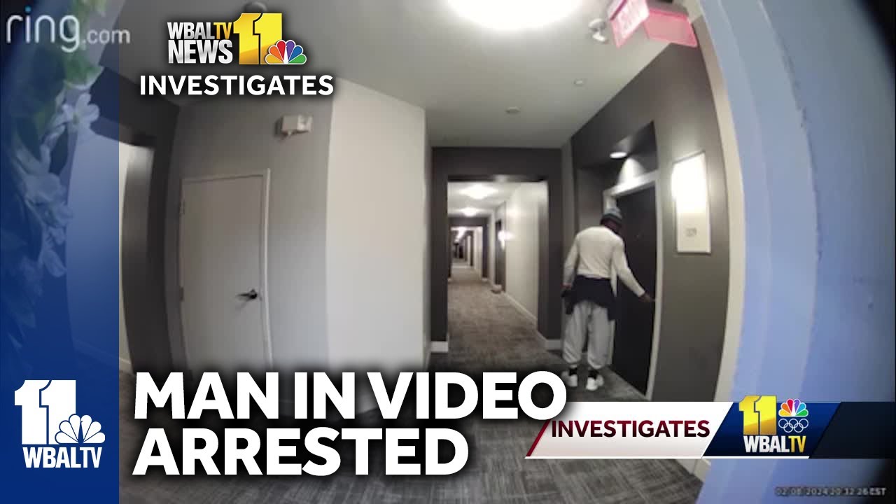 Man seen trying to enter apartment doors arrested, charged - YouTube