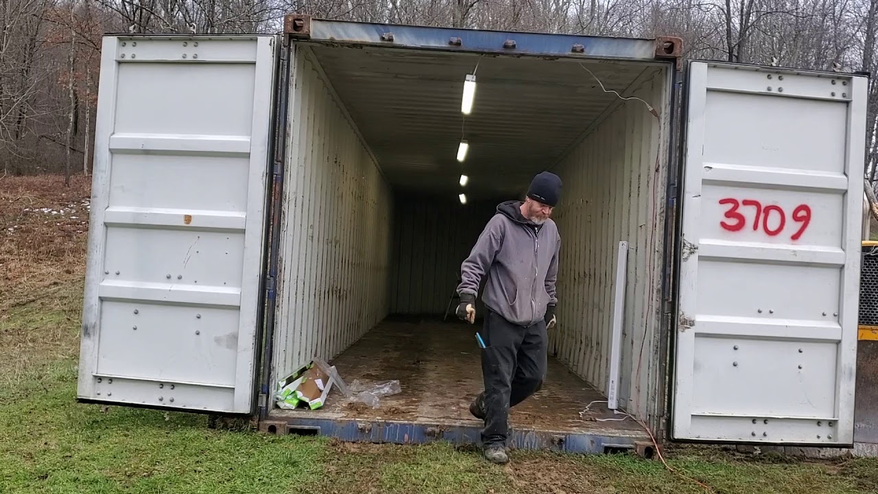 Installing new LED lights into shipping container - YouTube
