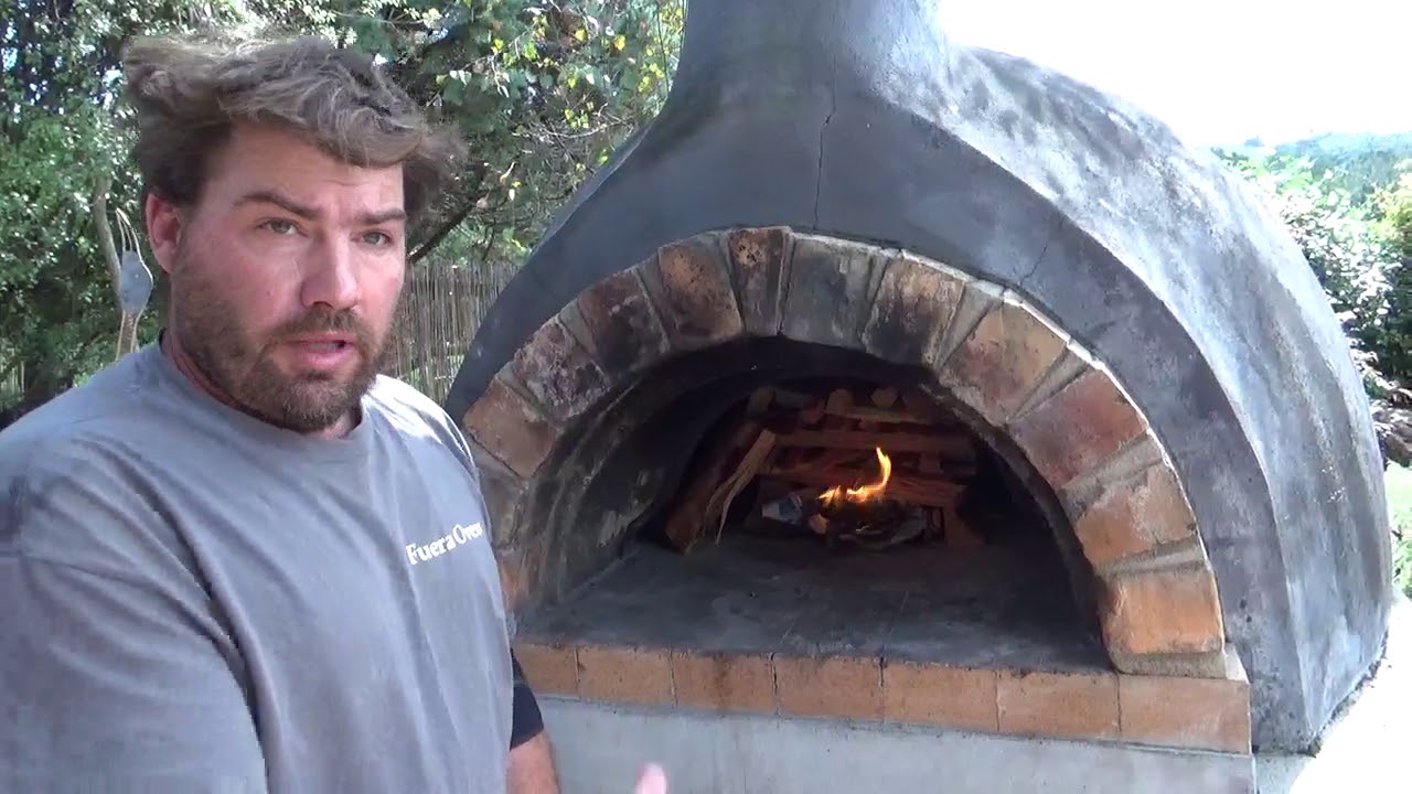 How to light a fire in a Pizza Oven - YouTube