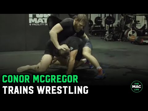 Conor McGregor trains wrestling; works the sweeps