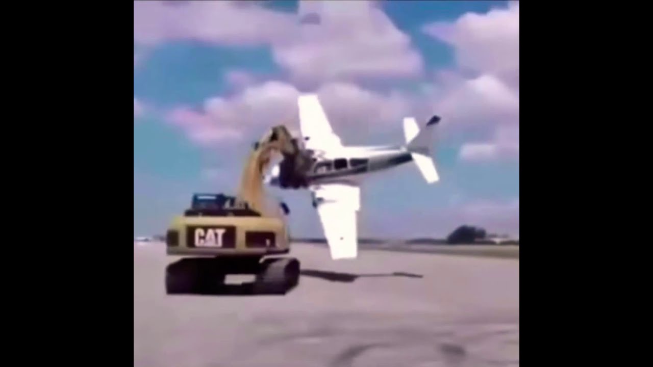 Just a video of an excavator spinning an airplane - YouTube