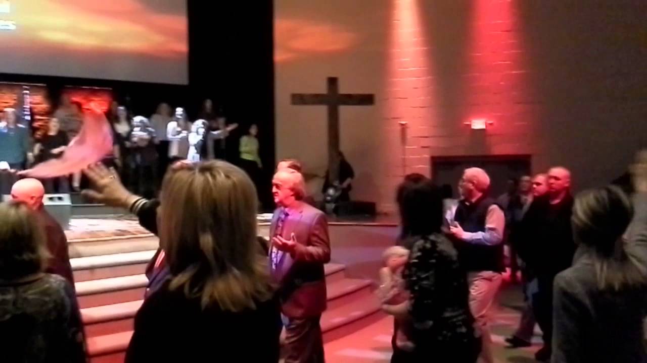 Marching around the church to break down walls - YouTube