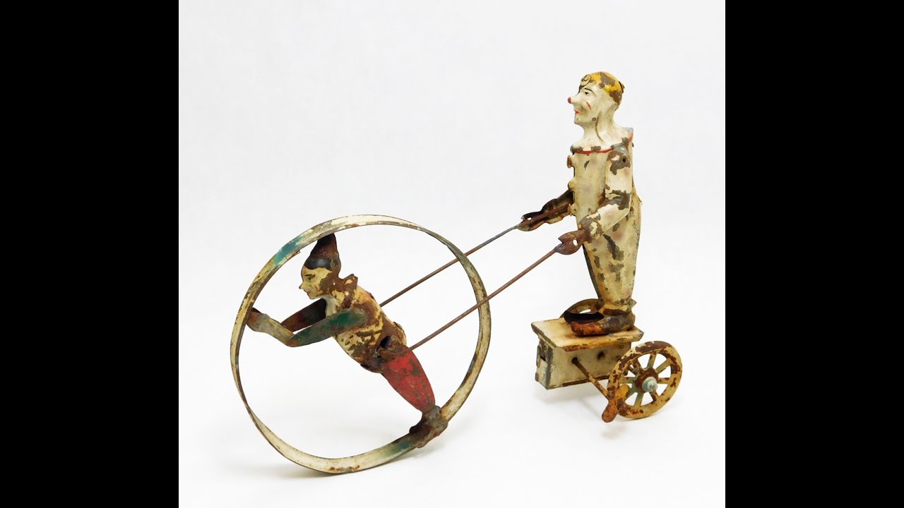 Guntherman Circus Clowns tin wind up toy - YouTube