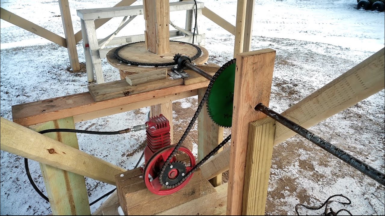 COLD winds→VAWT→'Side Bow' chain drive→red compressor - YouTube