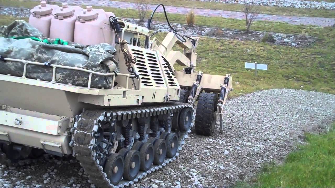 Protector Robot with a Mine Roller / Rake - YouTube