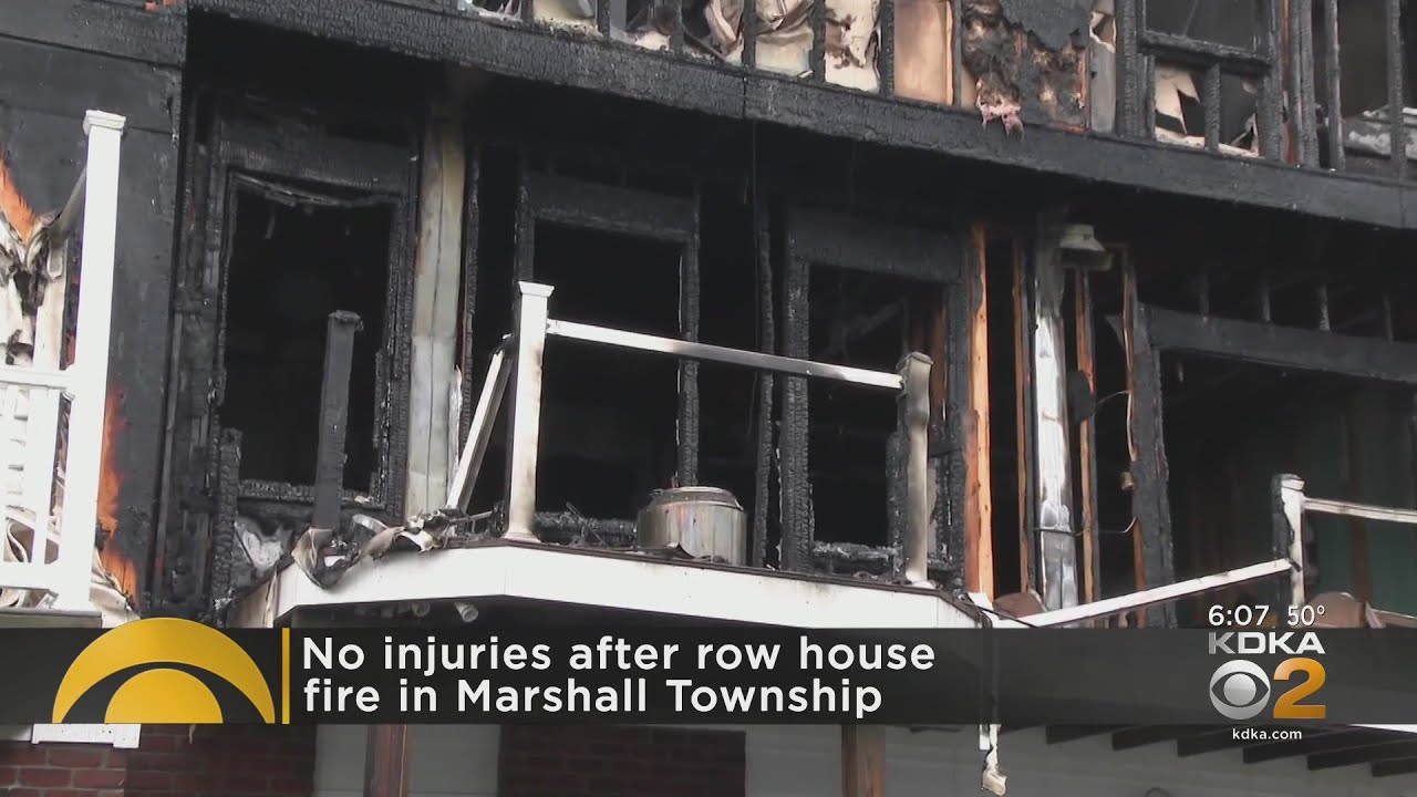 Fire Rapidly Spreads In Row Homes - YouTube